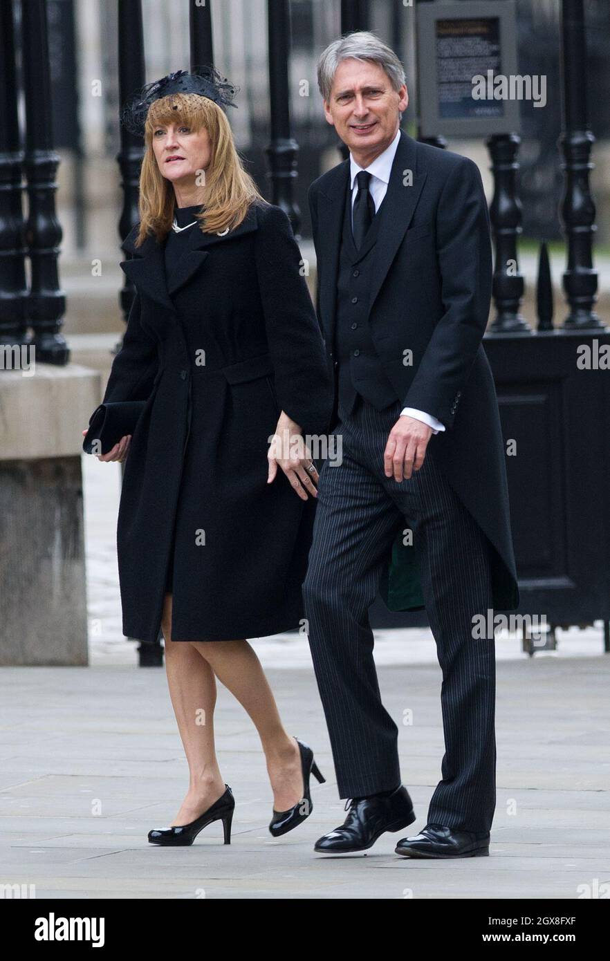 Philip Hammond and his wife Susan Hammond arrive for the funeral of ...