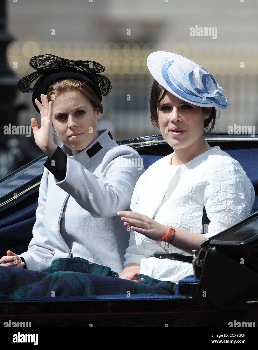 Princess Beatrice and Princess Eugenie travel in an open carriage to ...