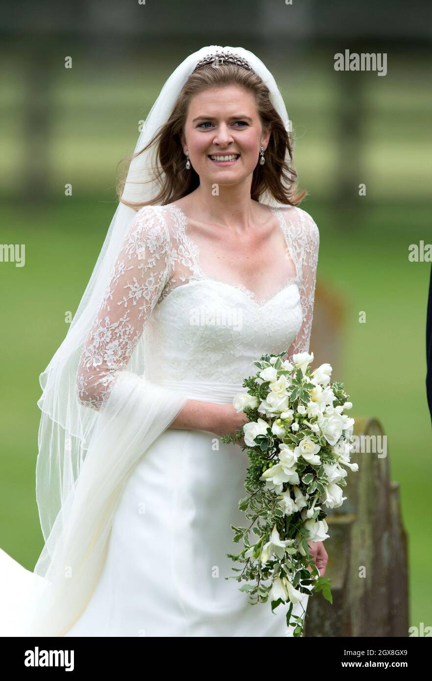 Lady Laura Marsham arrives to marry James Meade at St. Nicholas Church ...