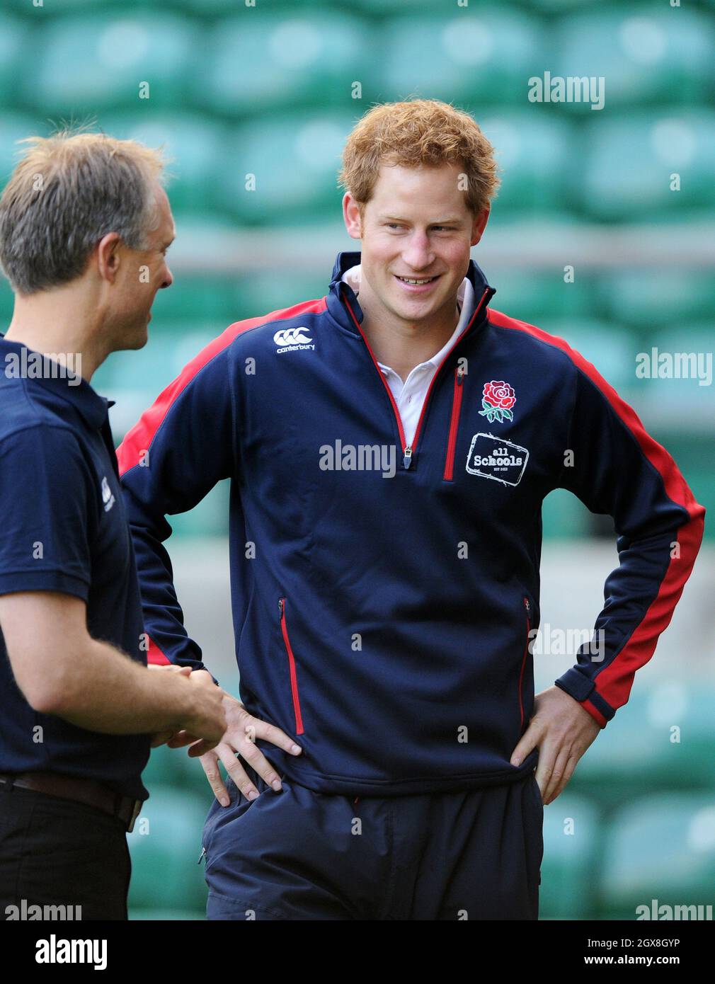 Prince Harry chats to Mark Saltmarsh (L) and Ian Ritchie at the Rugby ...