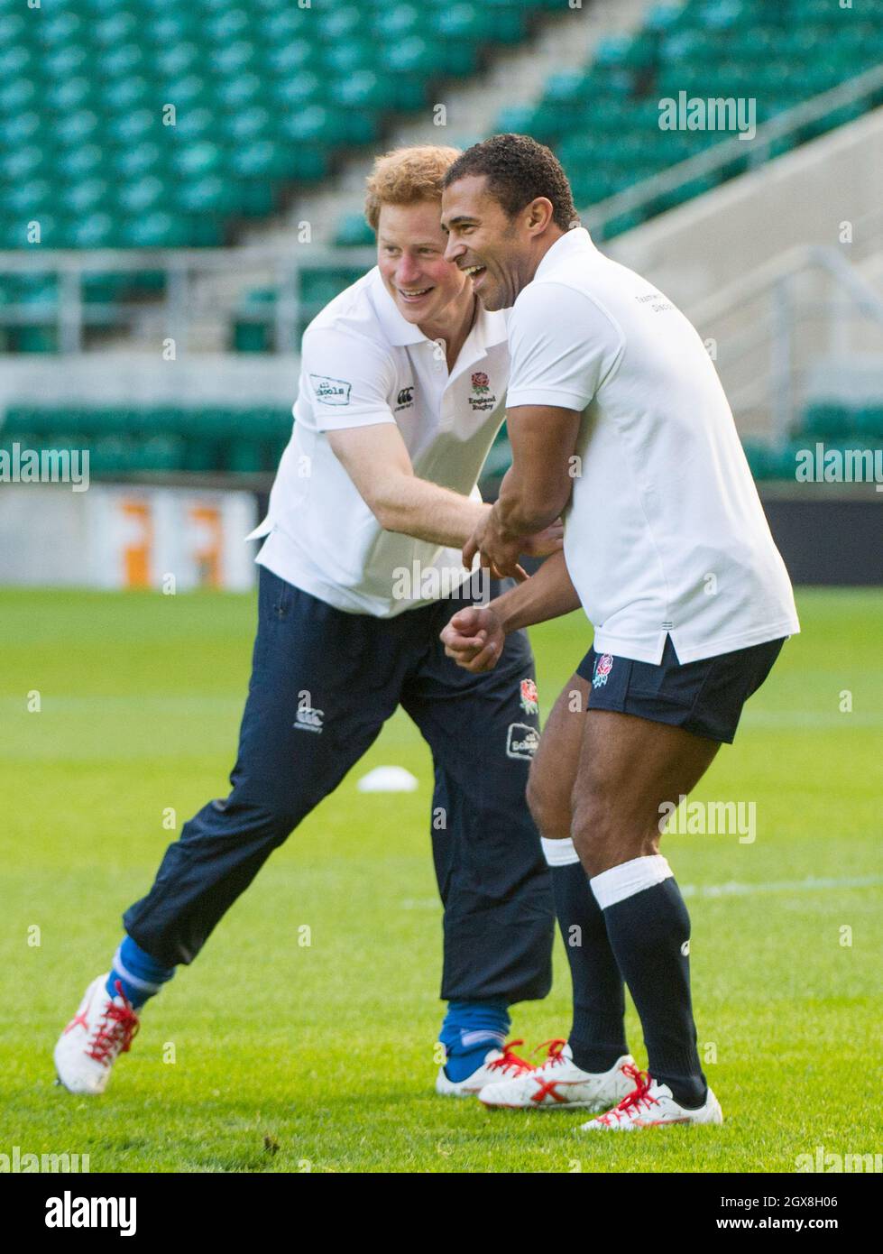 Prince Harry and former England International Jason Robinson take part ...