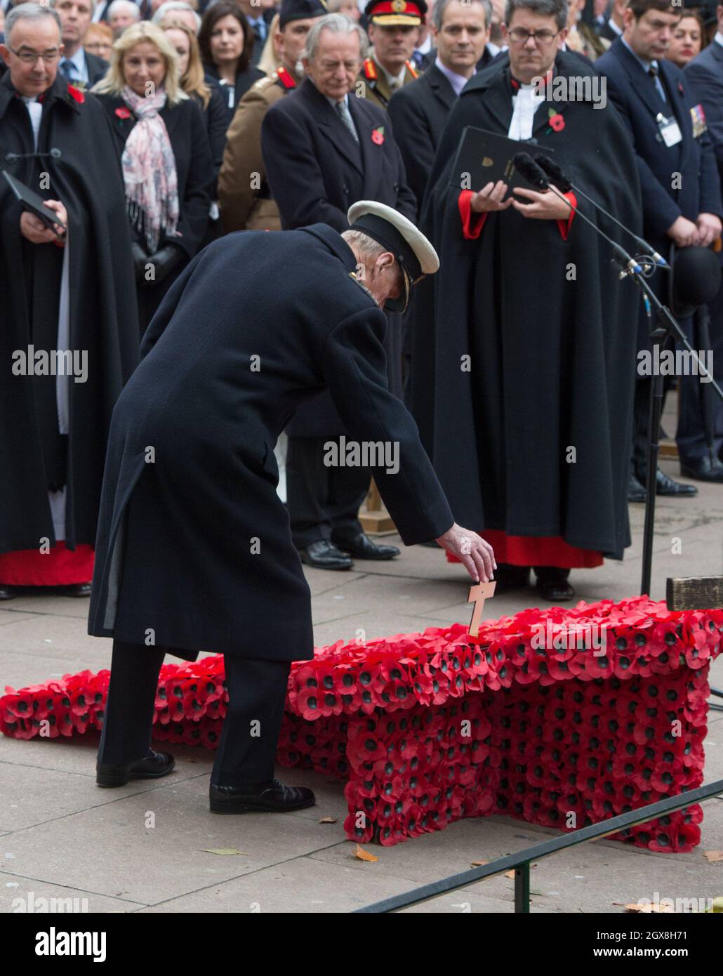 Prince Philip, Duke of Edinburgh lays a Cross of Remembrance as he ...