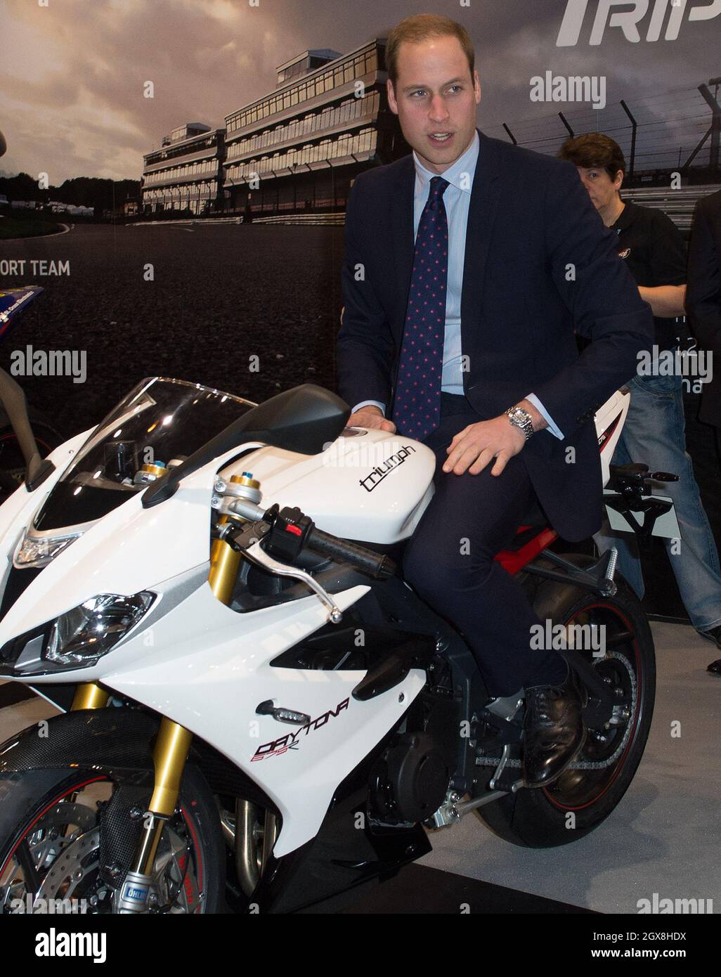 Prince William, Duke of Cambridge sits on a motorbike during a visit to ...