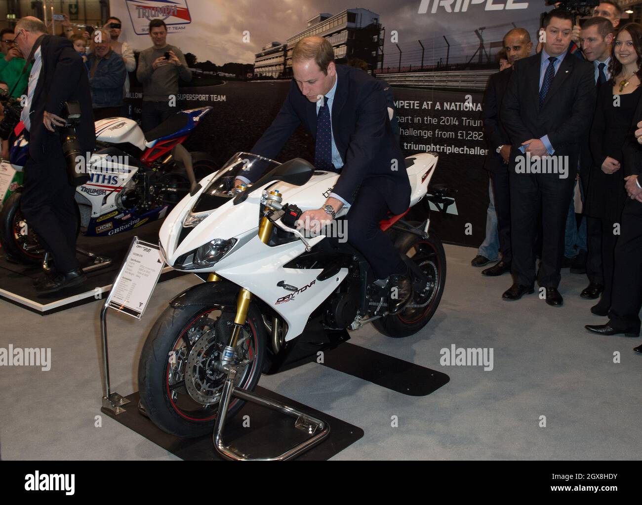 Prince William, Duke of Cambridge sits on a motorbike during a visit to ...