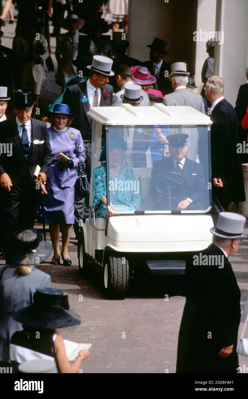 The Queen Mother is seen being driven in a buggy at Royal Ascot in ...