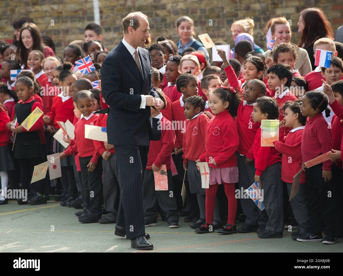Prince Edward, Earl of Wessex chats to school children as he visits the ...