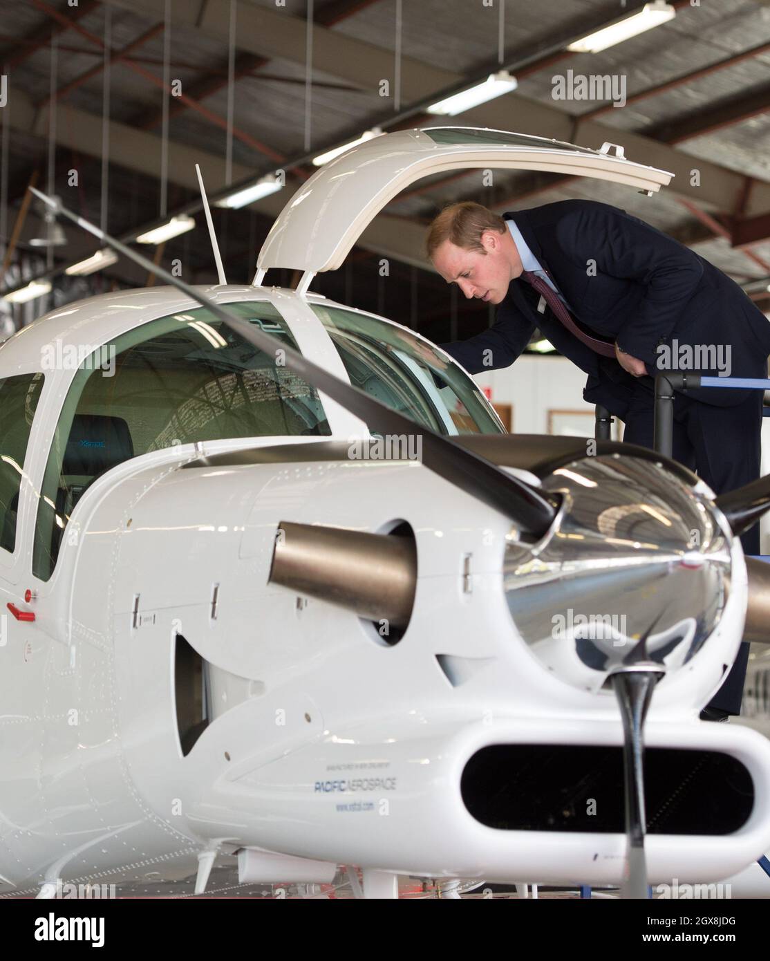 Prince William, Duke of Cambridge climbs into a plane during a visit to ...