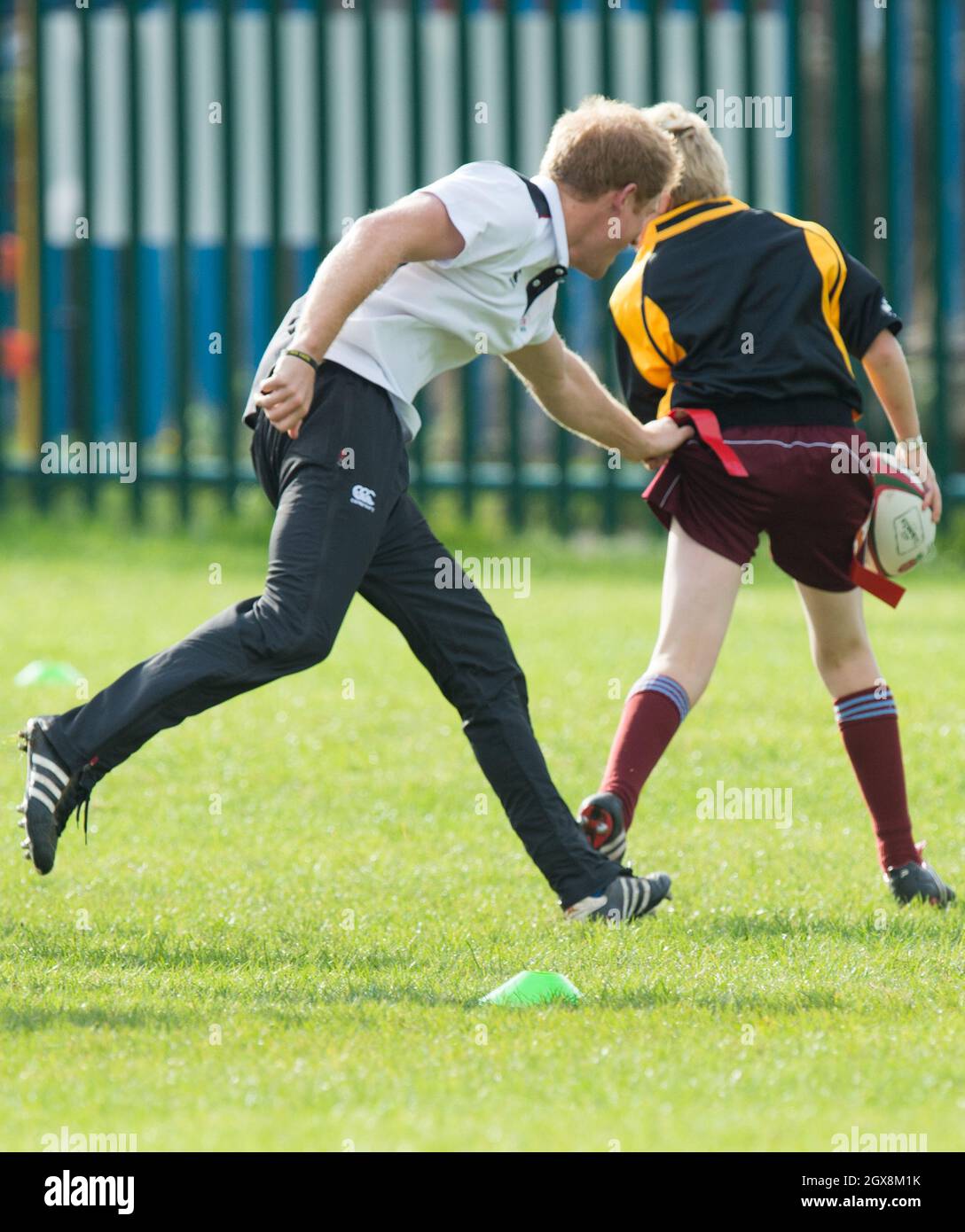 Prince Harry, Patron of England Rugby's All Schools Programme, plays ...