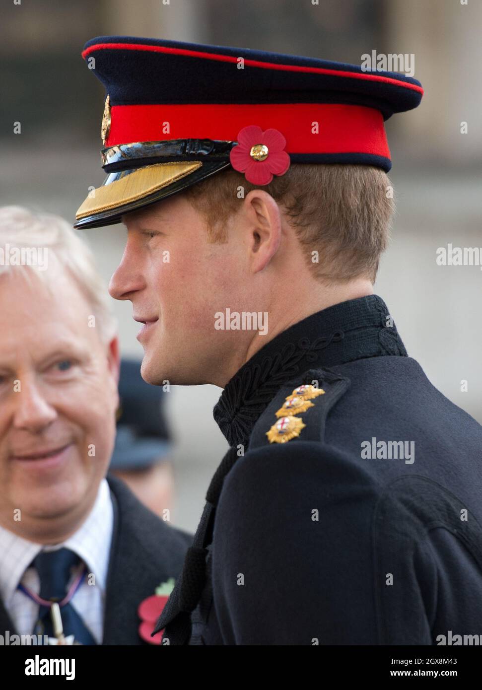 Prince Harry visits The Field of Remembrance at Westminster Abbey in ...