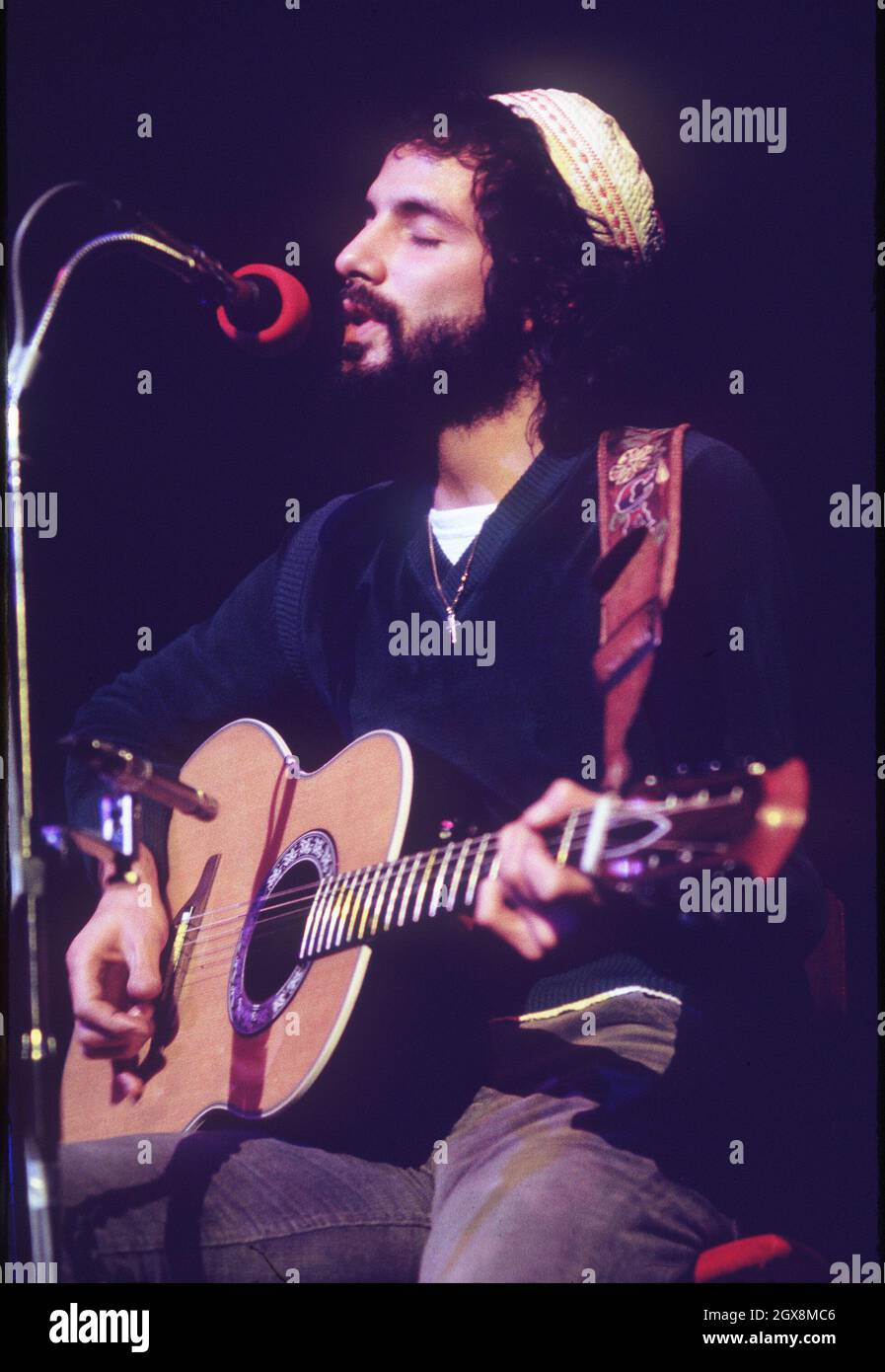 Cat Stevens, now known as Yusuf Islam, pictured in concert in 1975 ...