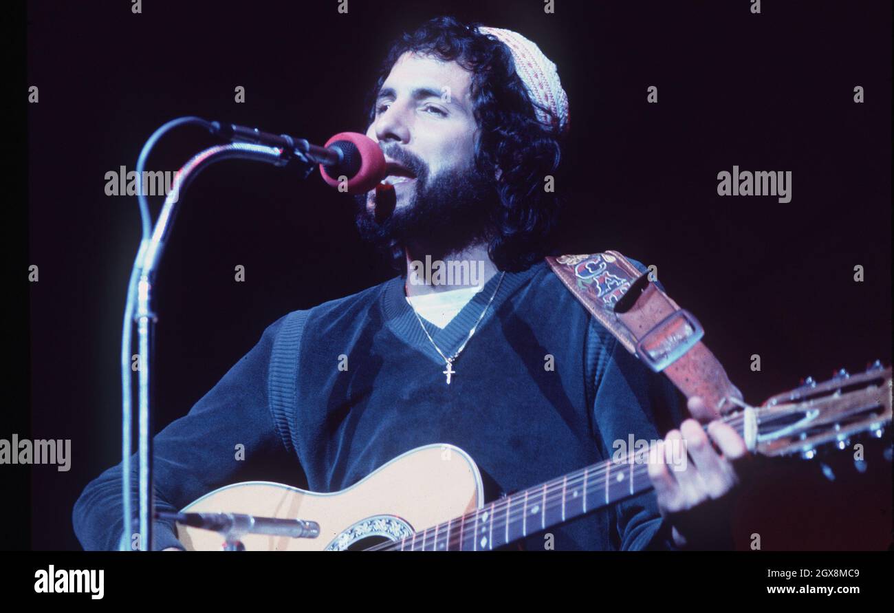 Cat Stevens, now known as Yusuf Islam, pictured in concert in 1975 ...