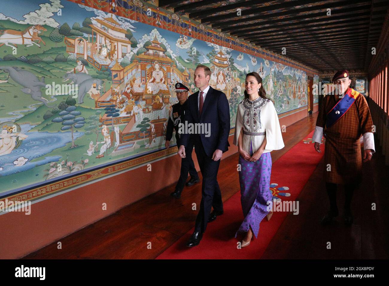 Prince William, Duke of Cambridge and Catherine, Duchess of Cambridge walk through the Lingkana ...