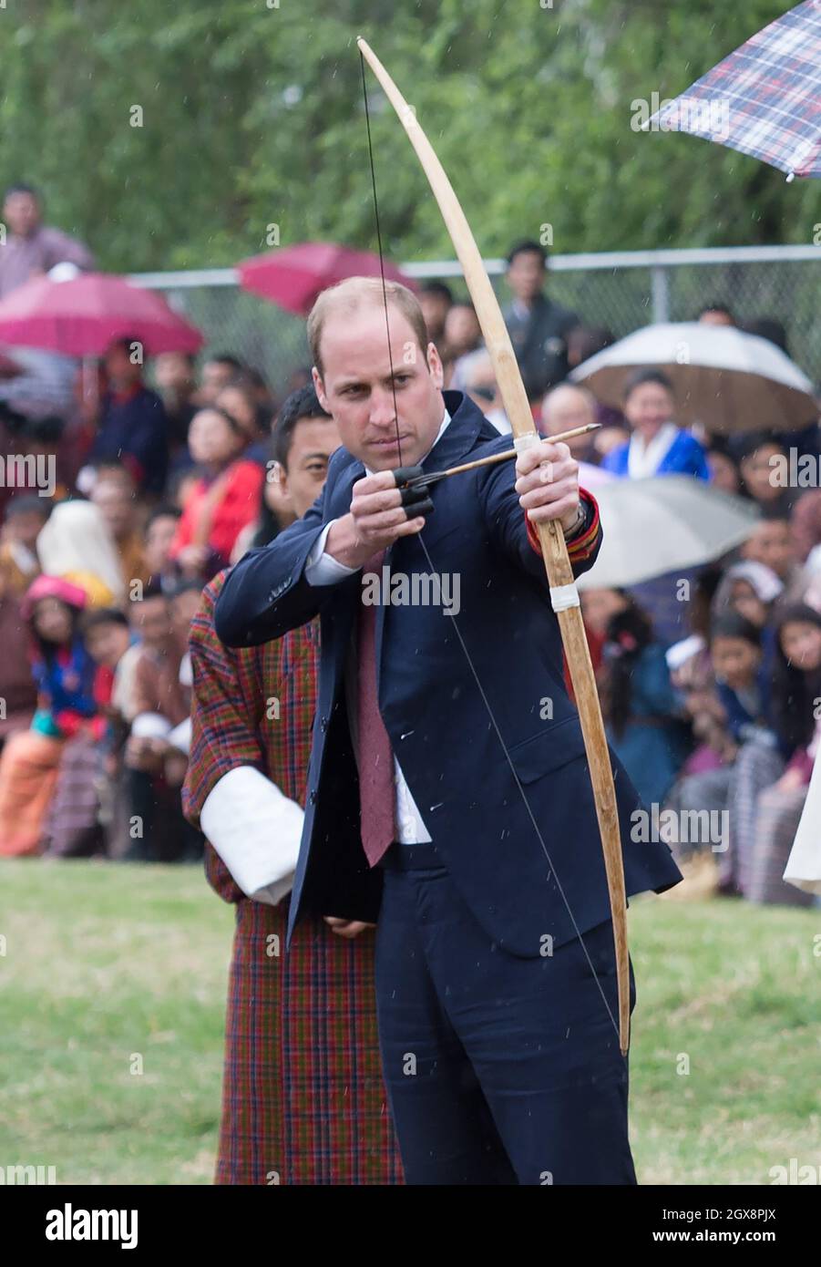 Prince William, Duke of Cambridge tries his hand at archery at an open ...