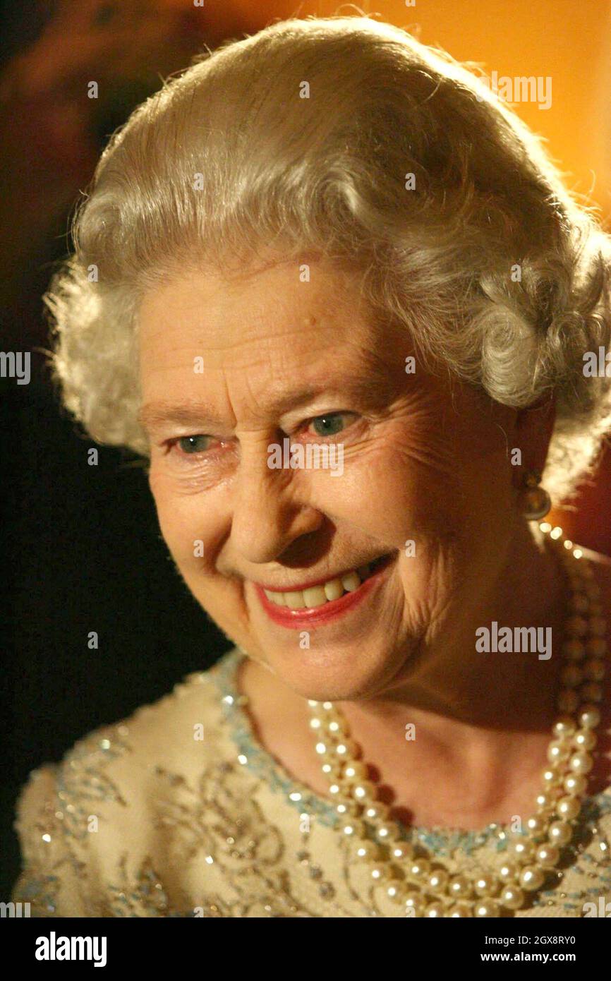 Queen Elizabeth II smiles as she mingles with guests at the ITV 50th ...