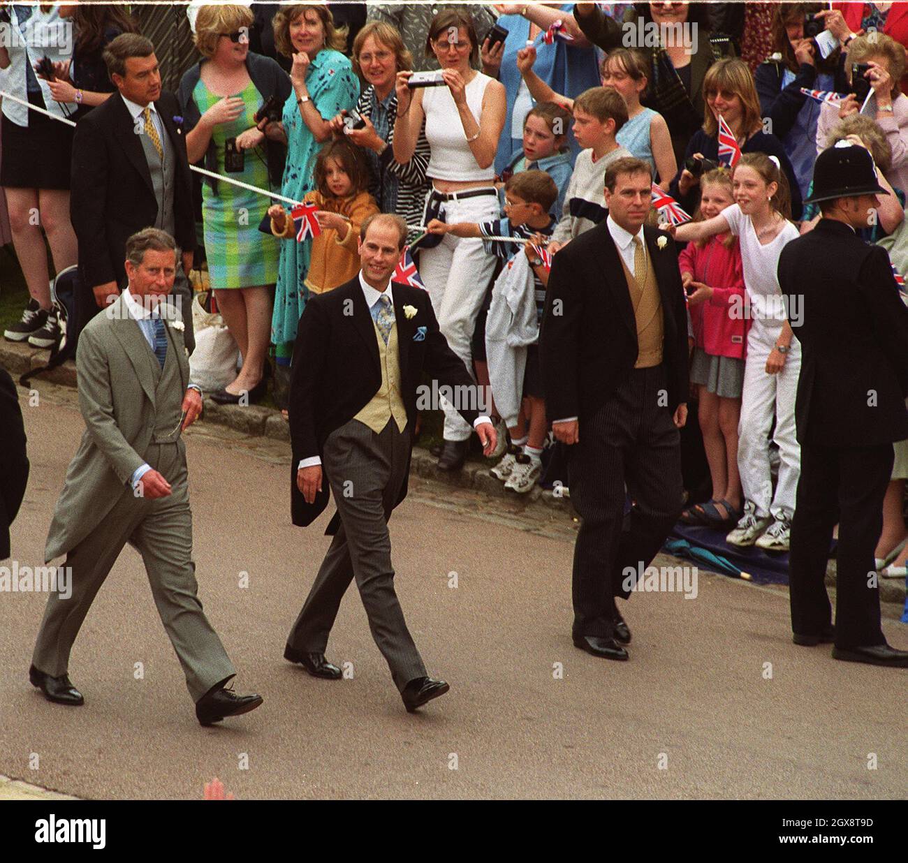 Prince Edward (centre) and his brothers the Prince of Wales (left) and ...