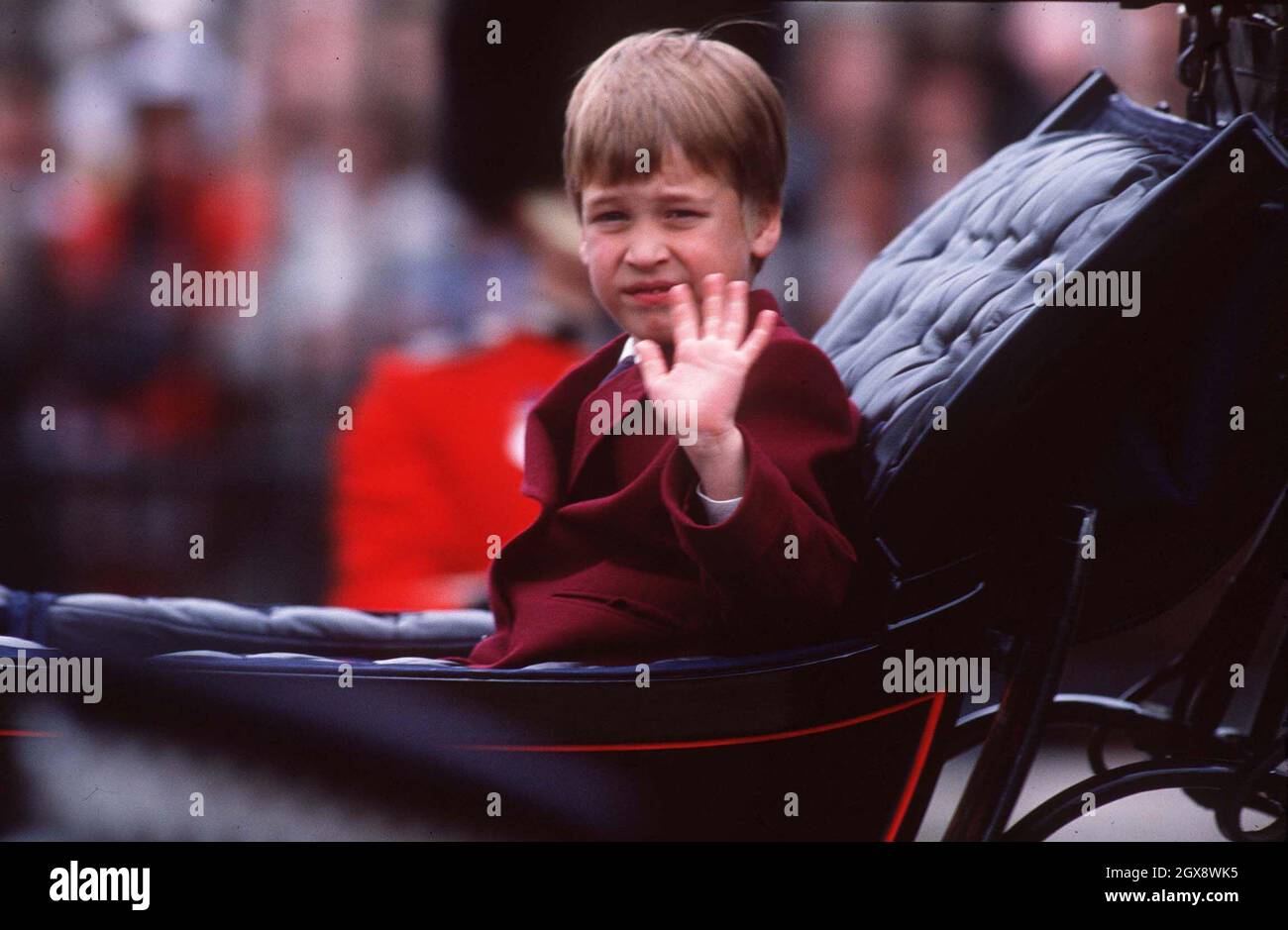 A young Prince William waves at Trooping the Colour, London in 1988 ...