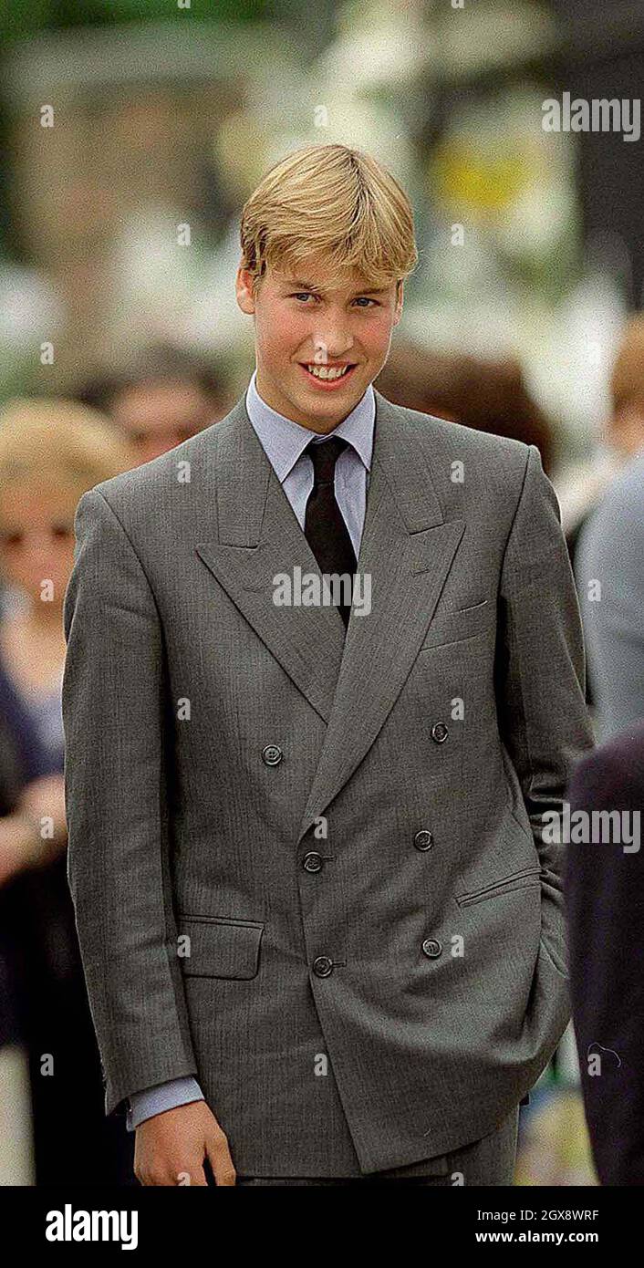 Prince William walks along outside Kensington Palace, London in 1997 to ...