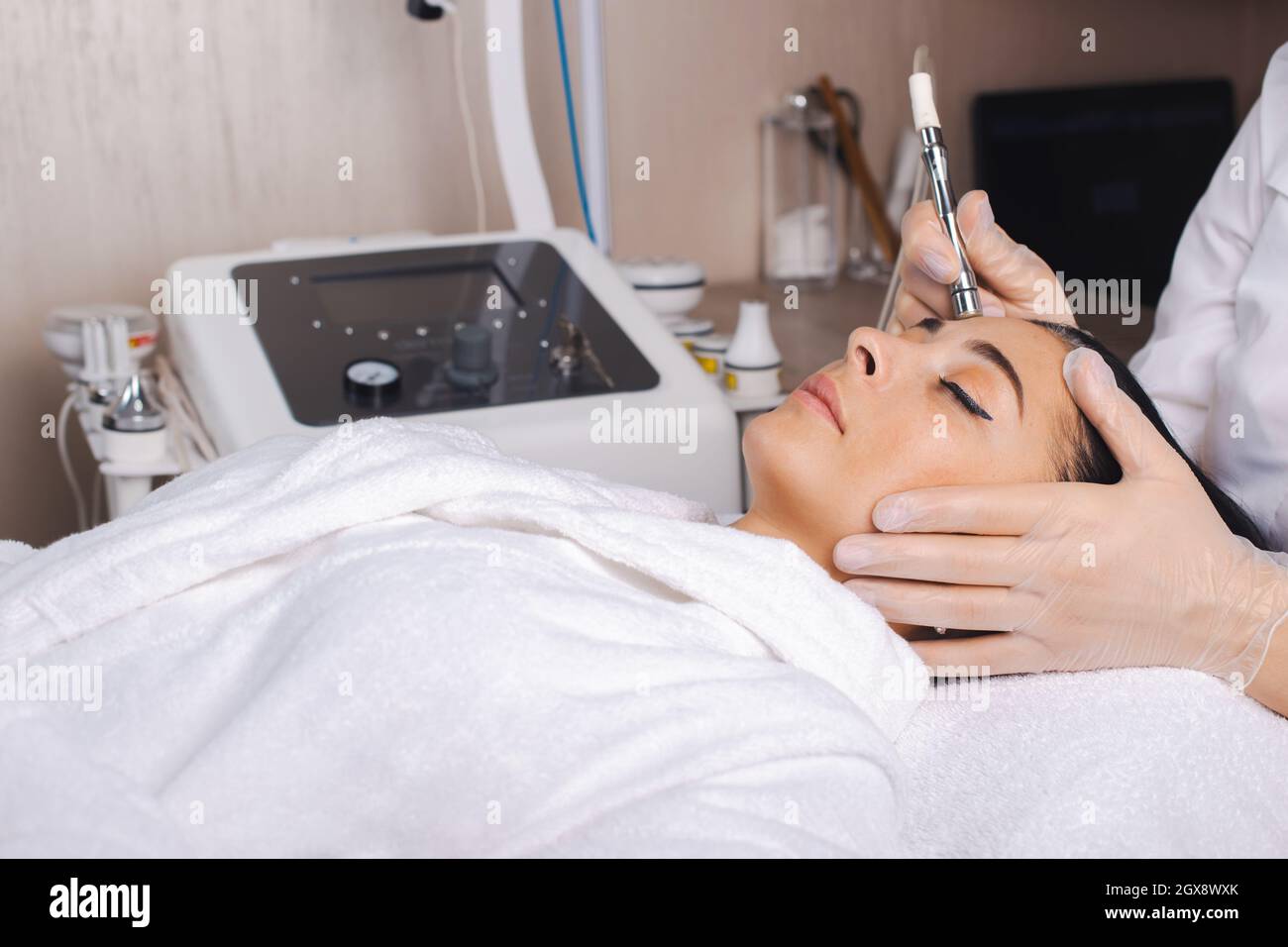 Cosmetology and beauty procedure at the spa salon. Facial skin ...