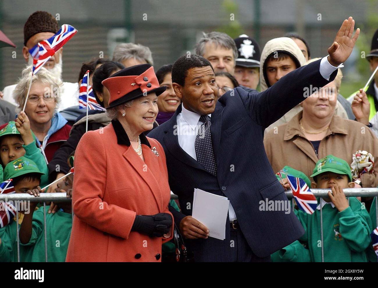 The Queen is met by Headmaster Hugh Howe as she arrives for a visit at ...