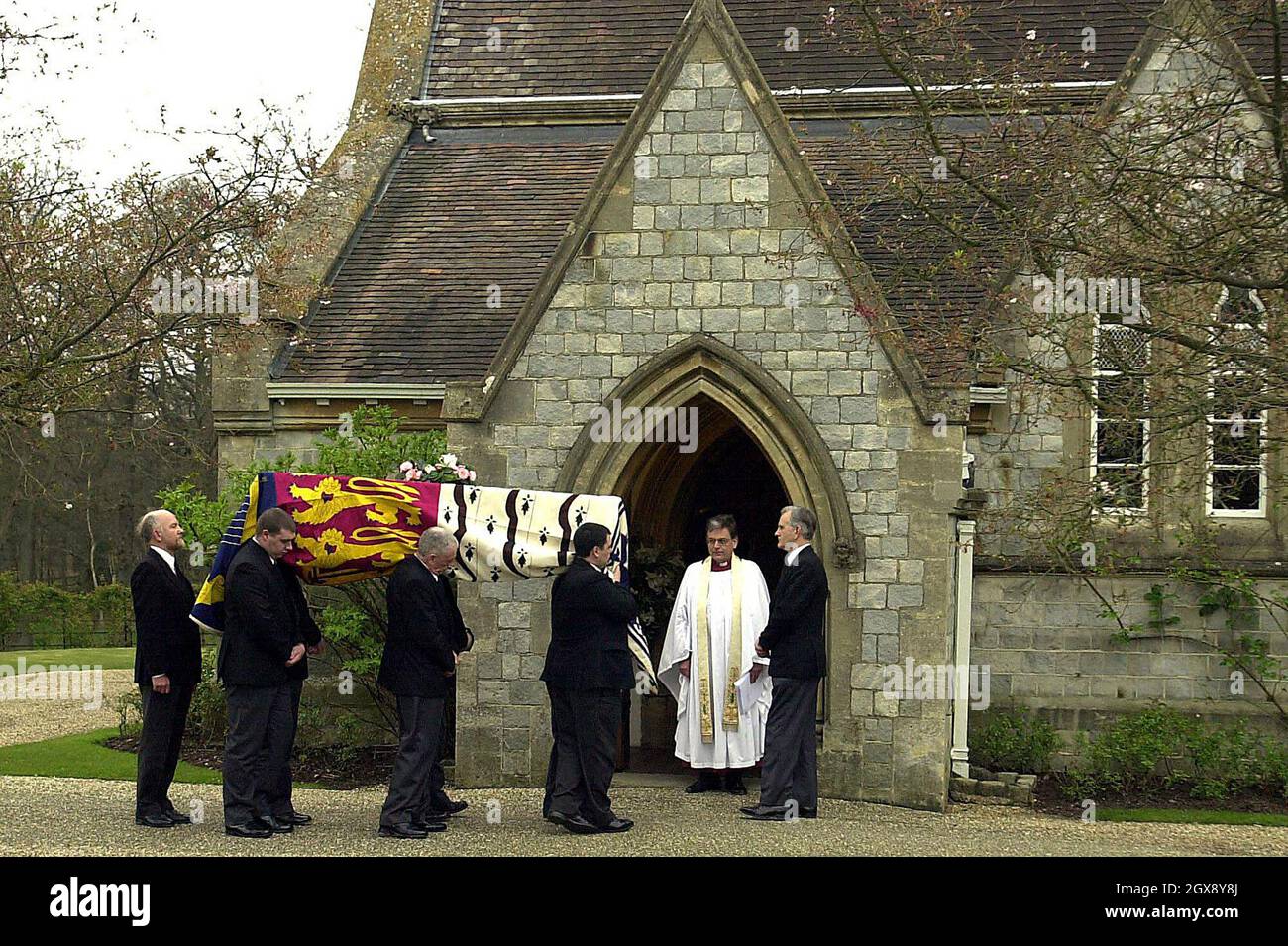 Six pallbearers carry the coffin Sunday March 31, 2002, of Queen ...