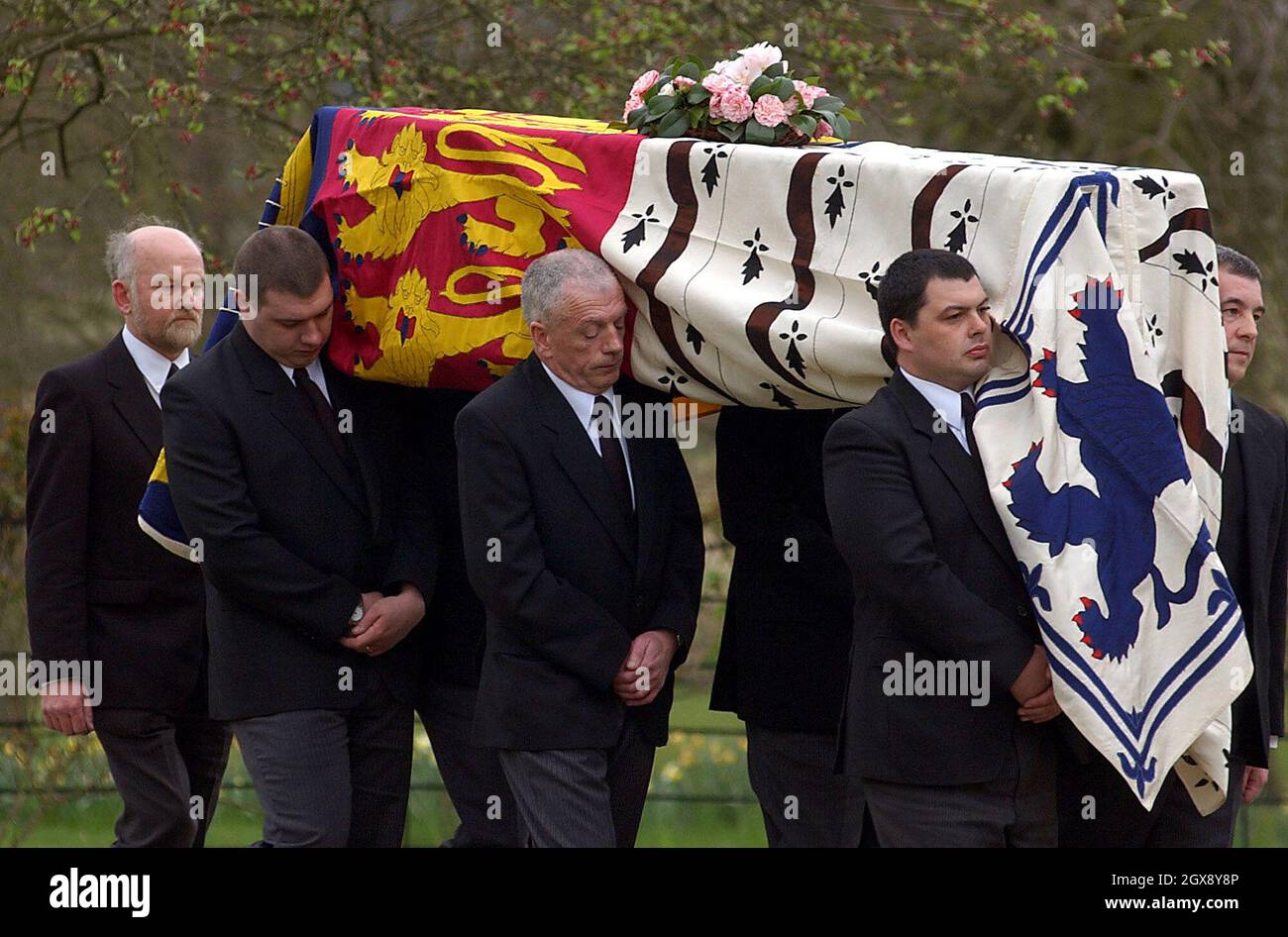 Six pallbearers carry the coffin Sunday March 31, 2002, of Queen ...