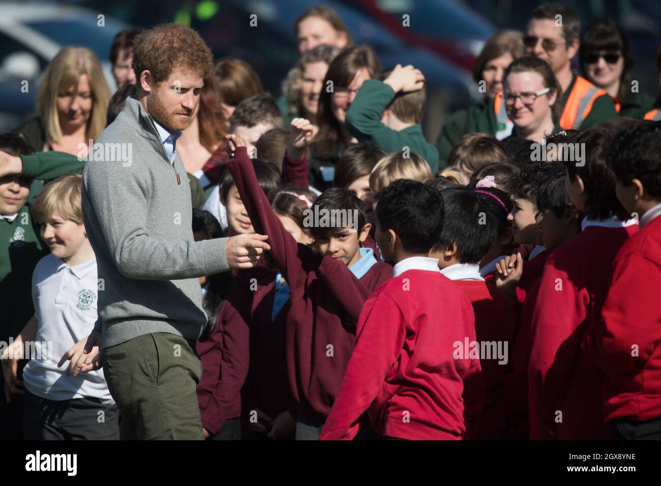 Prince Harry meets school children as he visits the Field Studies ...