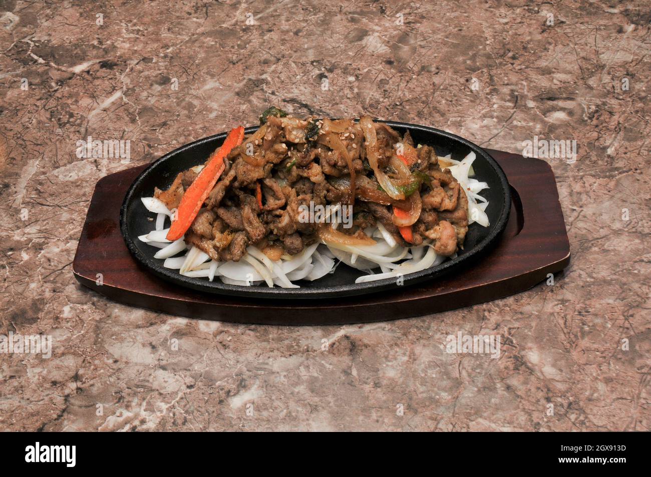 Delicious Korean dish known as pork bulgogi Stock Photo - Alamy