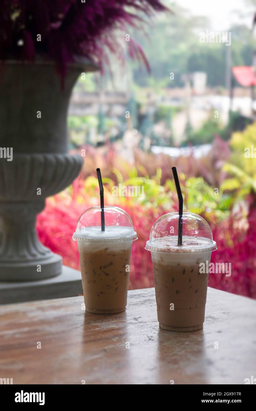 Iced coffee on dining table background, stock photo Stock Photo - Alamy