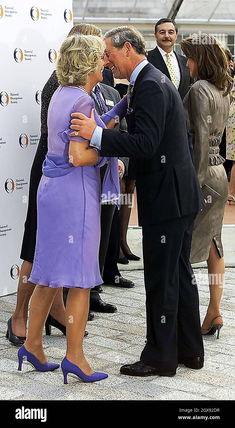 Prince Charles Kisses Camilla Parker Bowles At A Reception To Mark The 15th Anniversary Of The