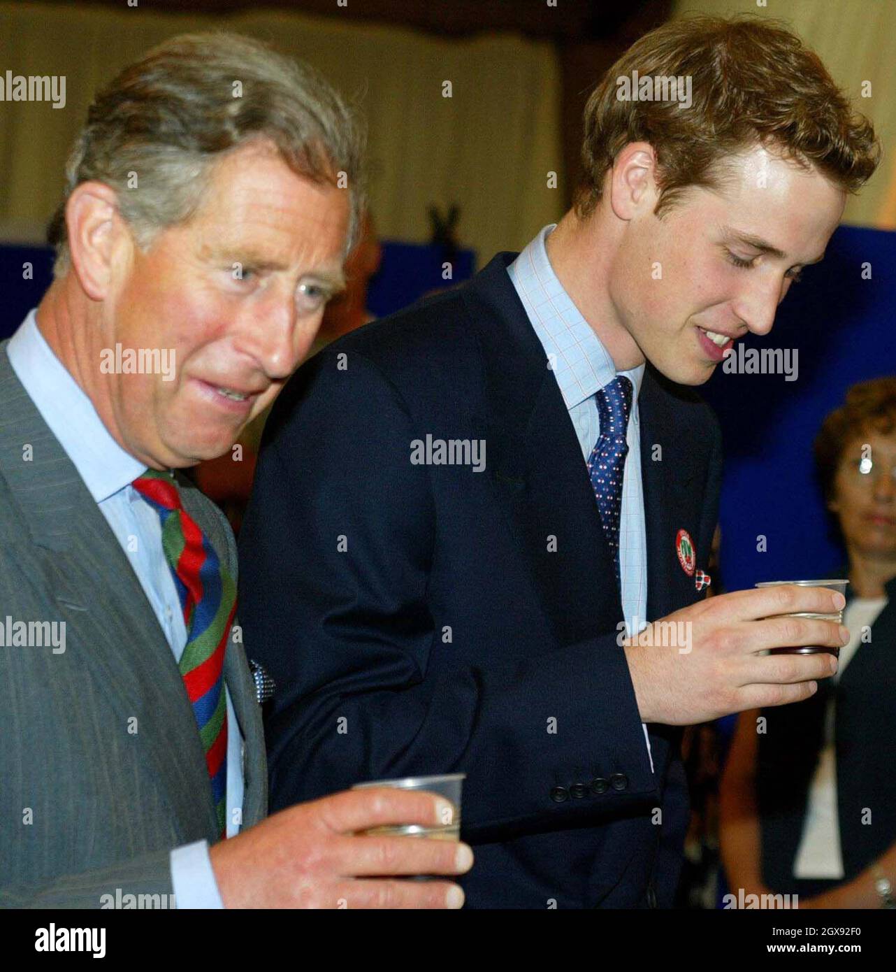 Prince William and his father, the Prince of Wales, sample a beer ...