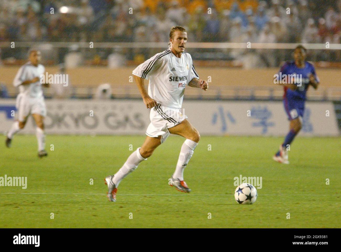 David Beckham playing for a Real Madrid during an exhibition match ...