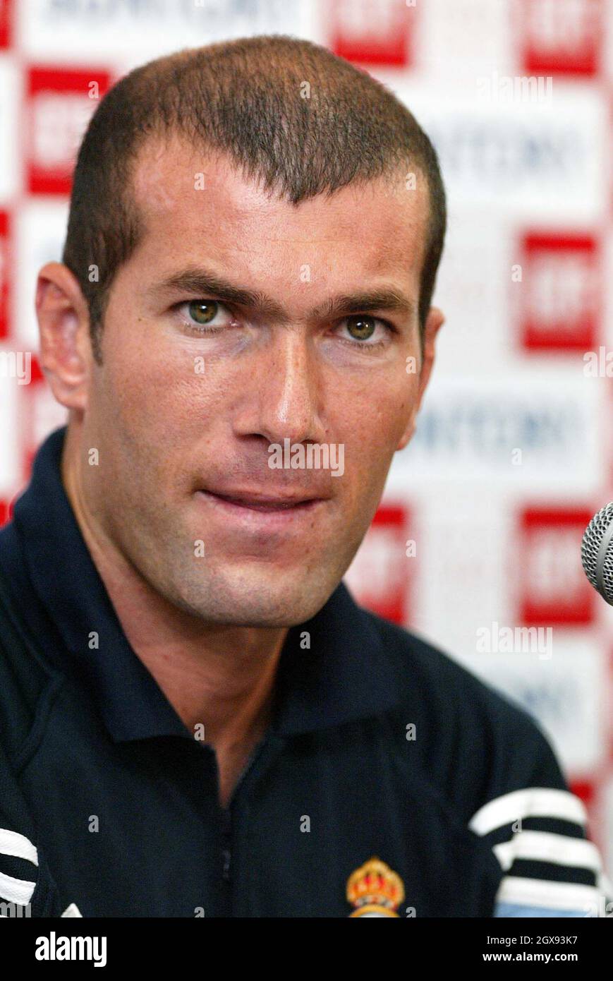 Real Madrid's Zinedine Zidane listens to reporter's questions during a ...