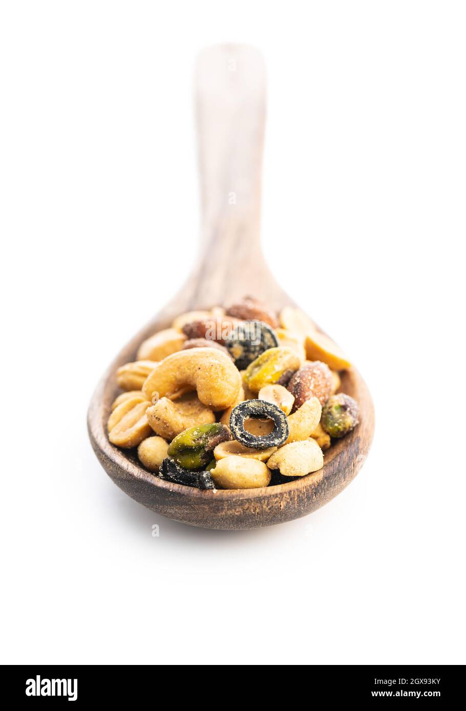 Mix of salted nuts in wooden spoon isolated on white background Stock ...