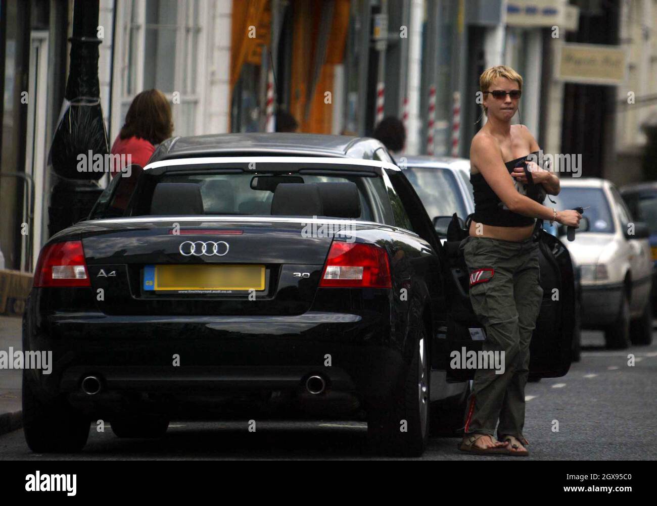 Sara Cox, Radio 1 presenter and DJ enjoys the sunny London weather as ...
