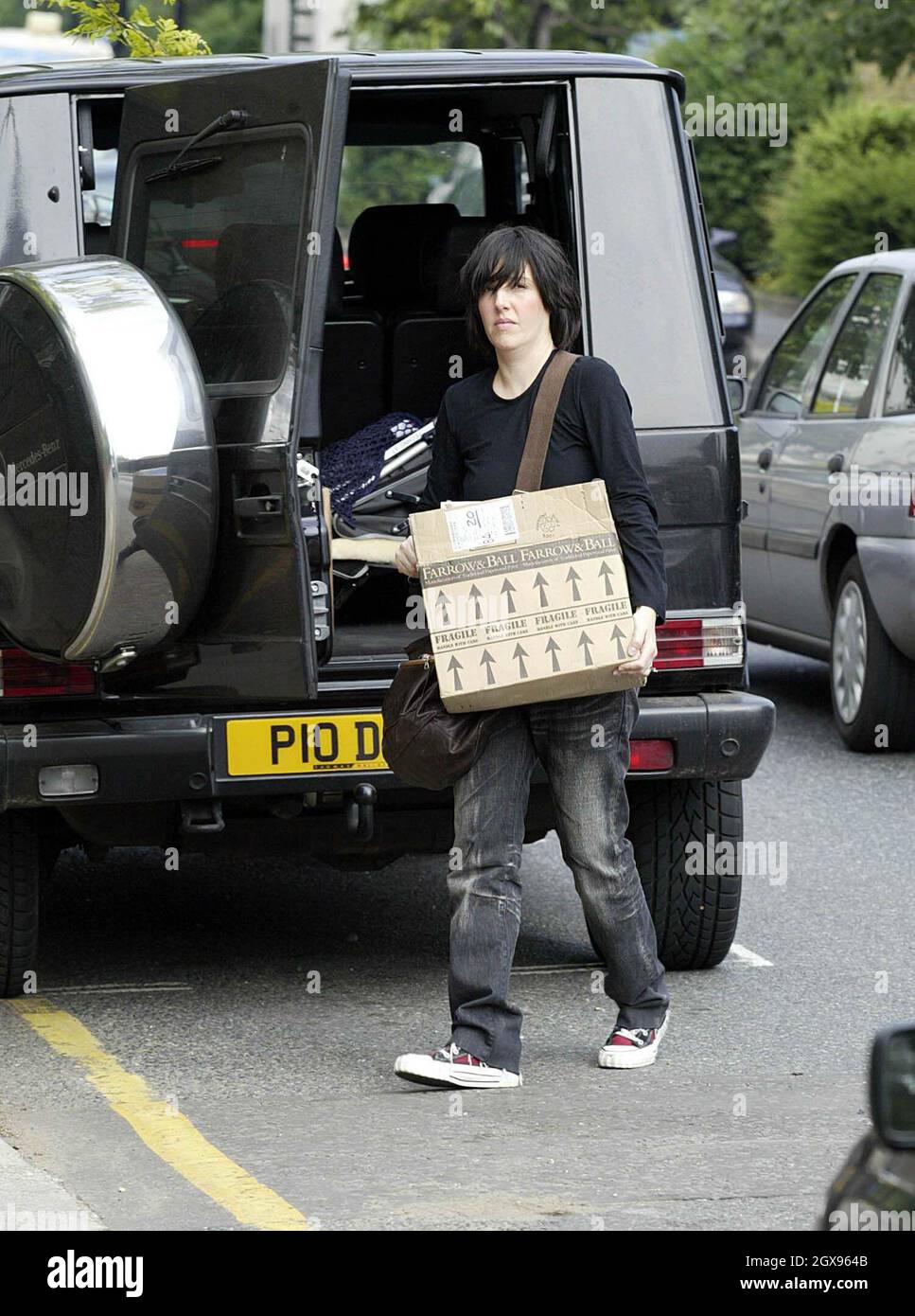 Sharleen Spiteri carries in shopping boxes to her North London home ...