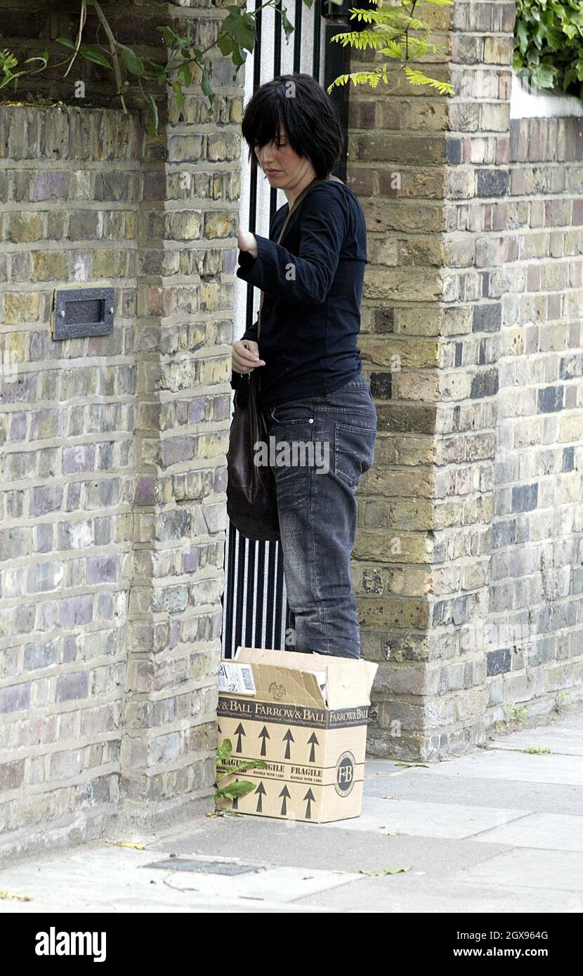 Sharleen Spiteri carries in shopping boxes to her North London home ...