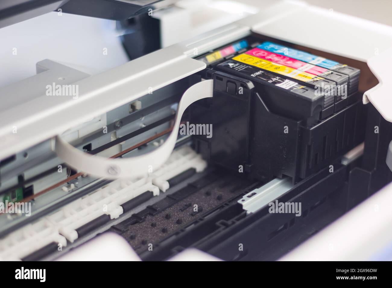 Putting new printer cartridge into the printer, inkjet Stock Photo - Alamy