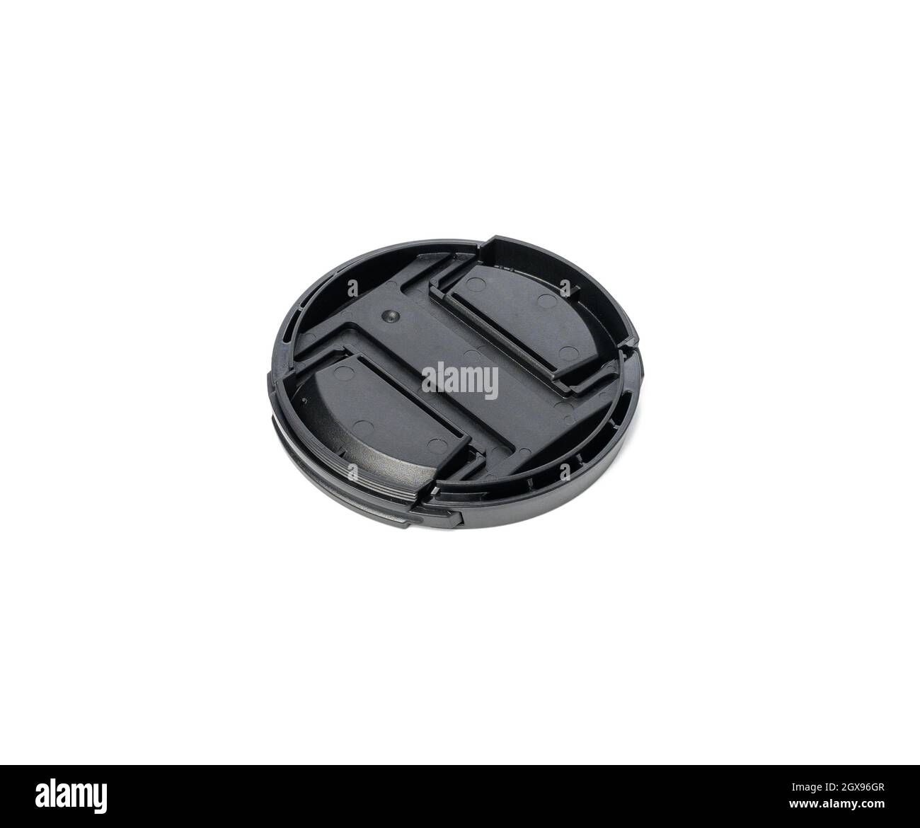 round black plastic camera lens cap isolated on white background, close ...