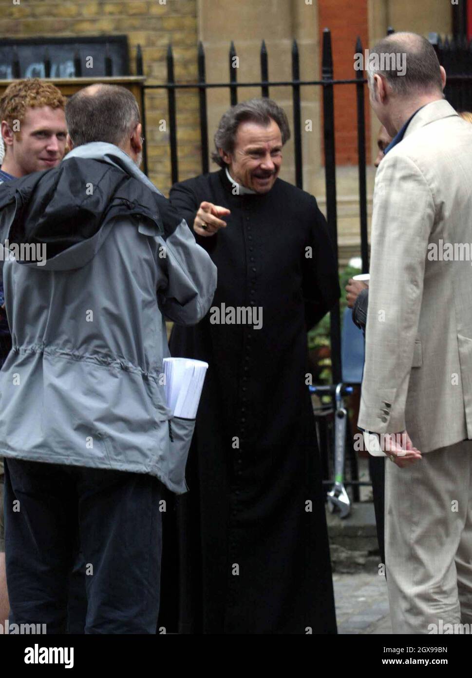 Harvey Keitel dressed as a priest on the set of a new film Red Light ...