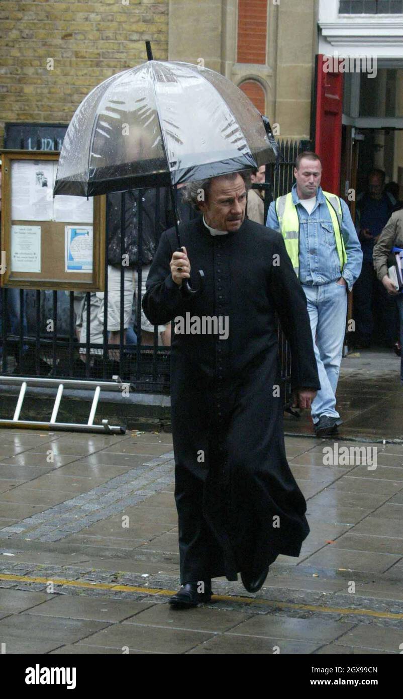 Harvey Keitel dressed as a priest on the set of a new film Red Light ...