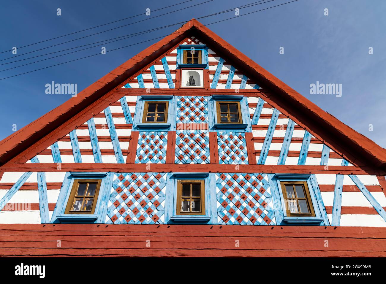 Half-timbered farmhouse, folk architecture in Milhostov, Western ...