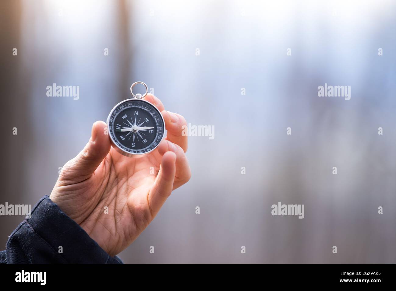 Business man holding compass hi-res stock photography and images - Alamy