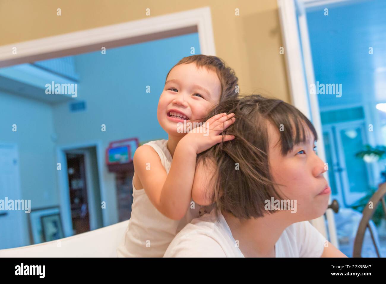 Happy Mixed Race Chinese and Caucasian Boy Having Fun with Chinese ...