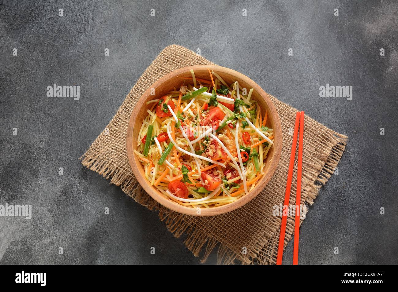 Delicious Som Tam -Thai green papaya salad) with green beans, tomatoes ...