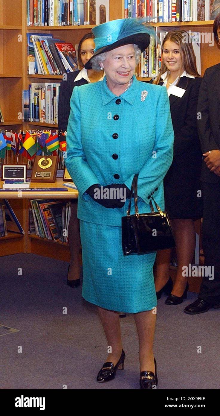Britain's Queen Elizabeth II tours the library during a visit to The ...