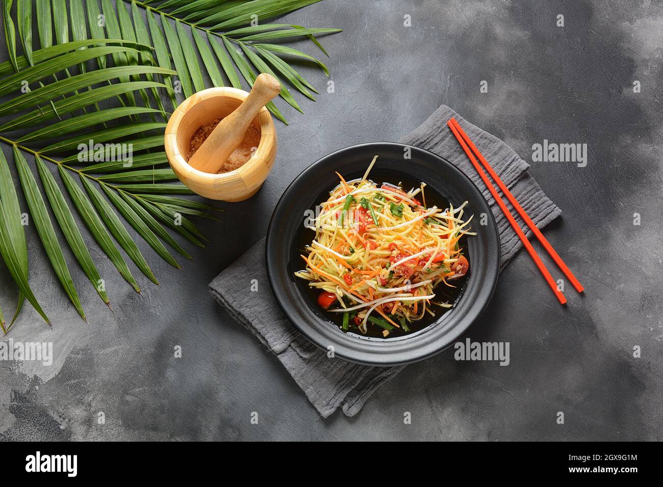 Delicious Som Tam -Thai green papaya salad) with green beans, tomatoes ...