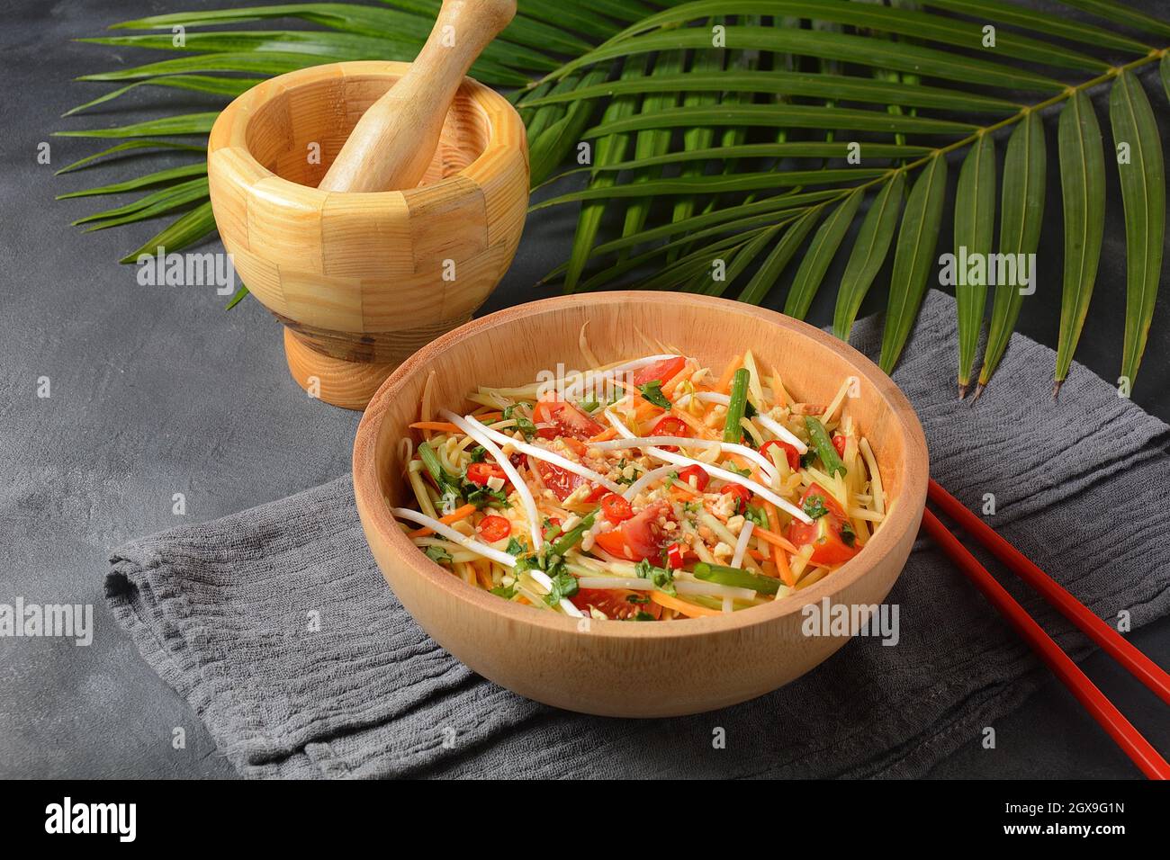 Delicious Som Tam -Thai green papaya salad) with green beans, tomatoes ...