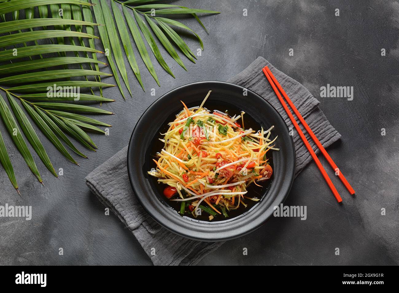 Delicious Som Tam -Thai green papaya salad) with green beans, tomatoes ...
