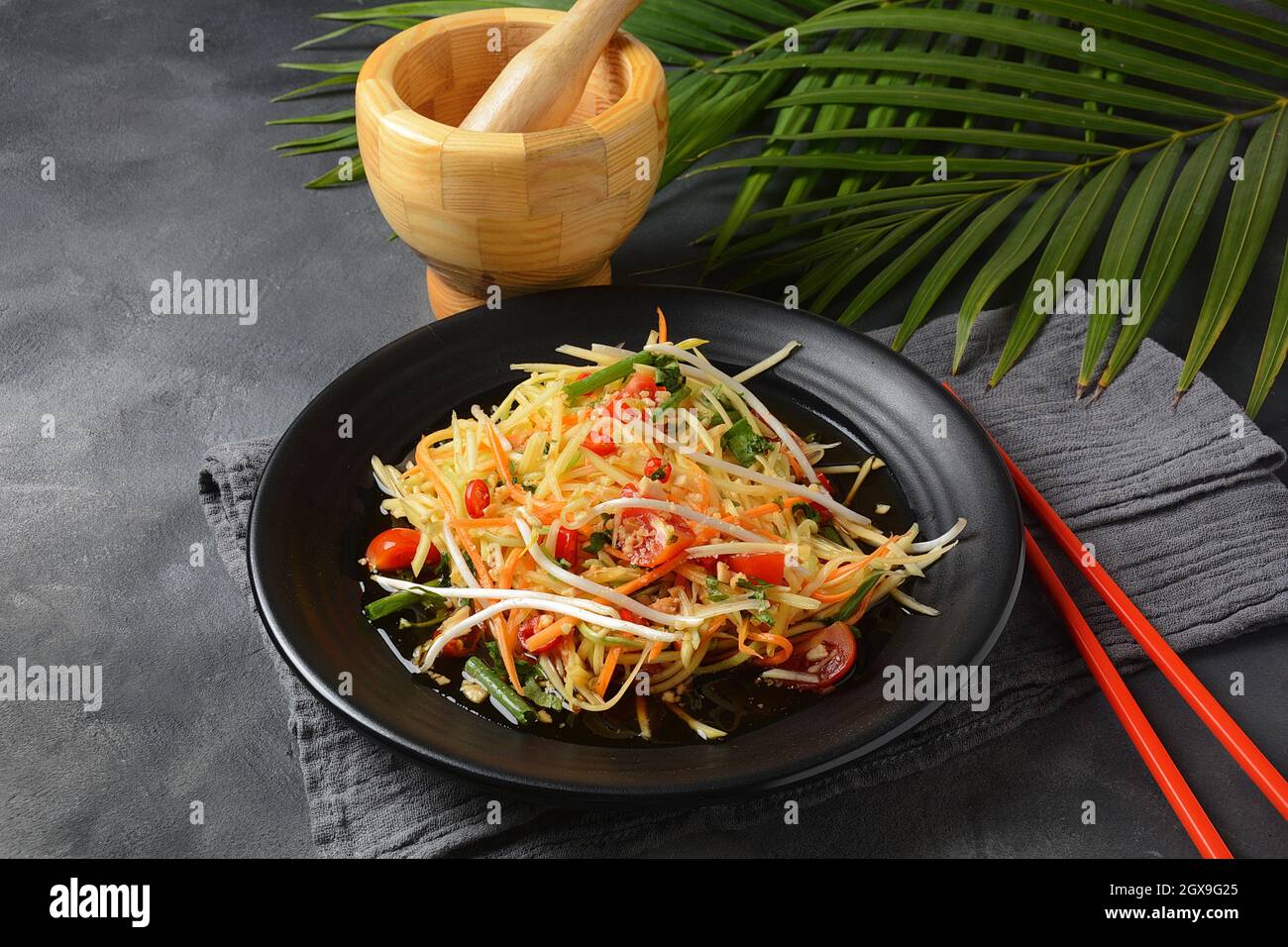 Delicious Som Tam -Thai green papaya salad) with green beans, tomatoes ...