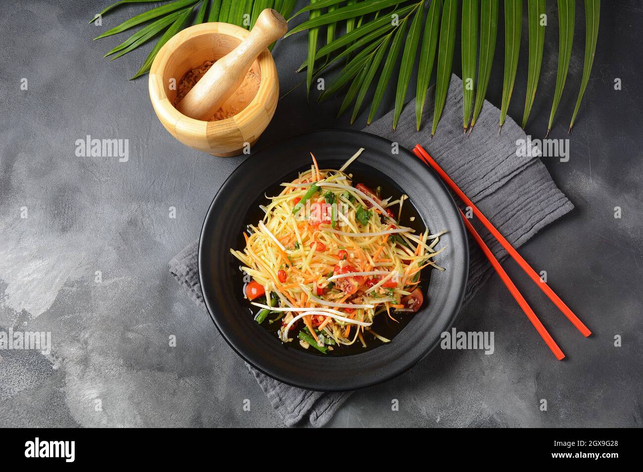 Delicious Som Tam -Thai green papaya salad) with green beans, tomatoes ...